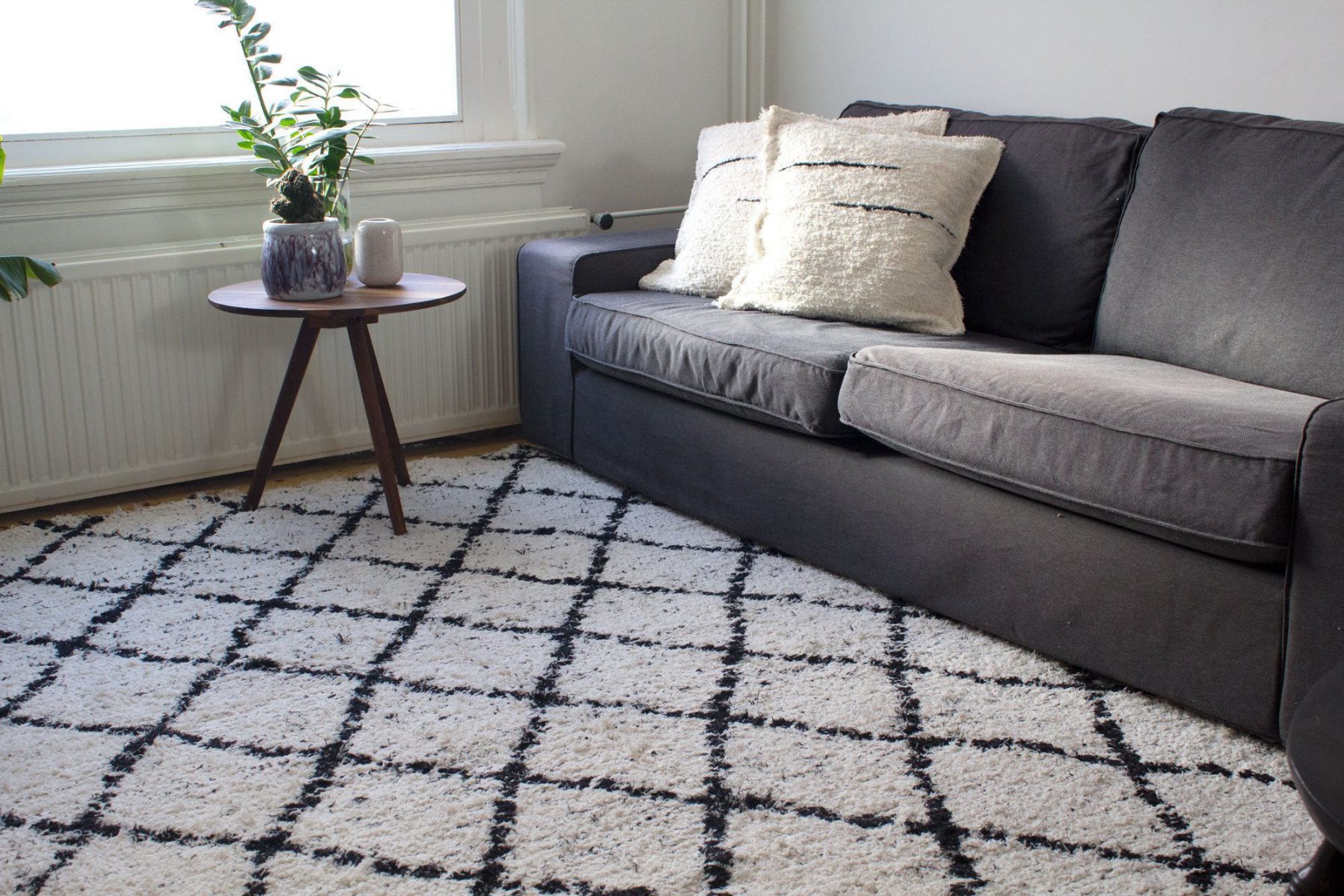 Reversible rough diamond rug from upcycled cotton with tassles in black ...